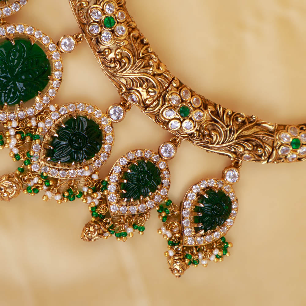 Gold Plated Hasli Choker Necklace with Carved Emeralds – Sneha Rateria ...
